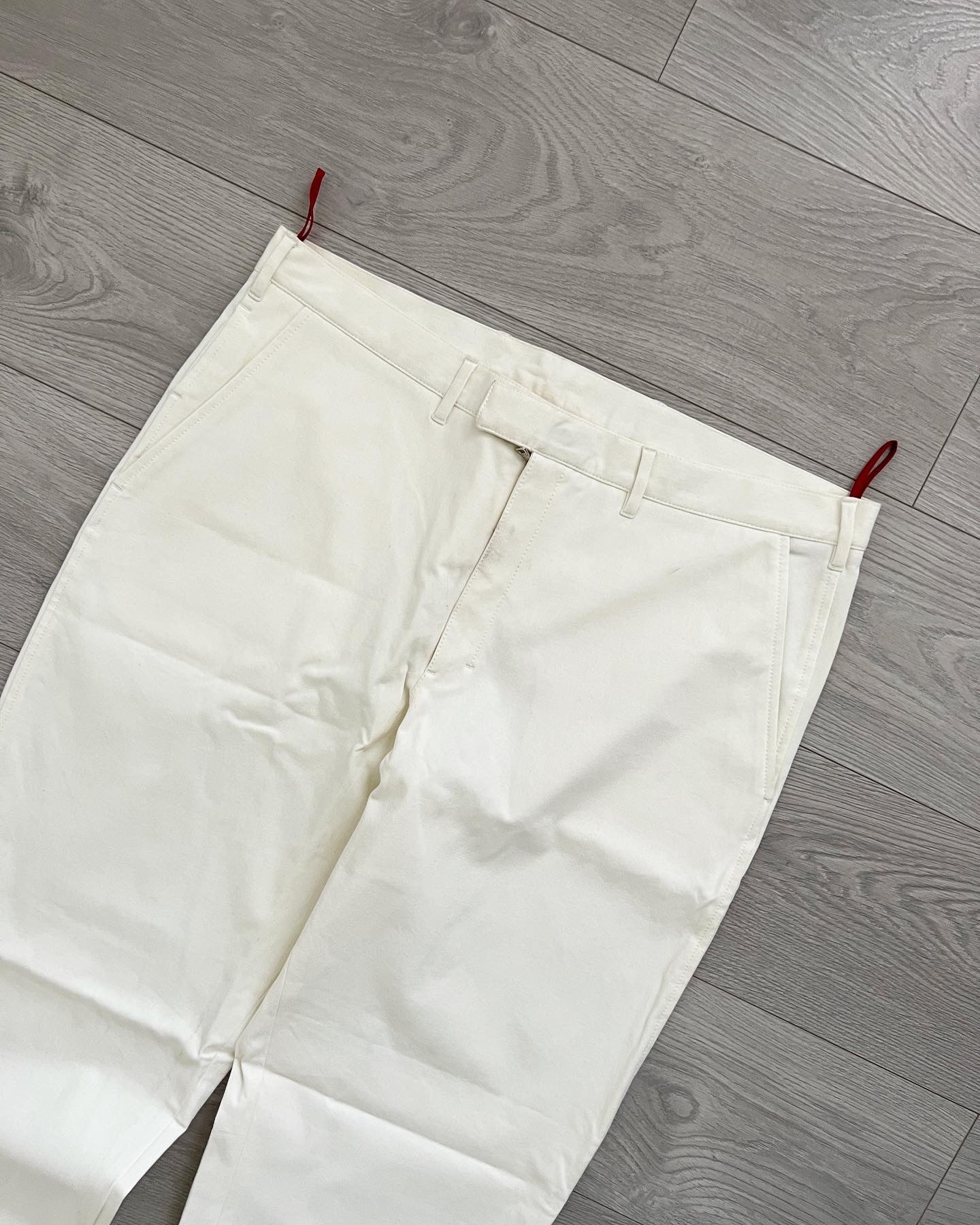 Prada Sport FW2002 Red Tab White Pants - Size 38 – NDWC0 Shop Prada Sport FW2002 Red Tab White Pants - Size 38 – NDWC0 Shop